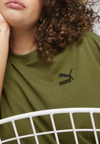 Puma BETTER - T-Shirt basic - olive green/oliv - Zalando.at