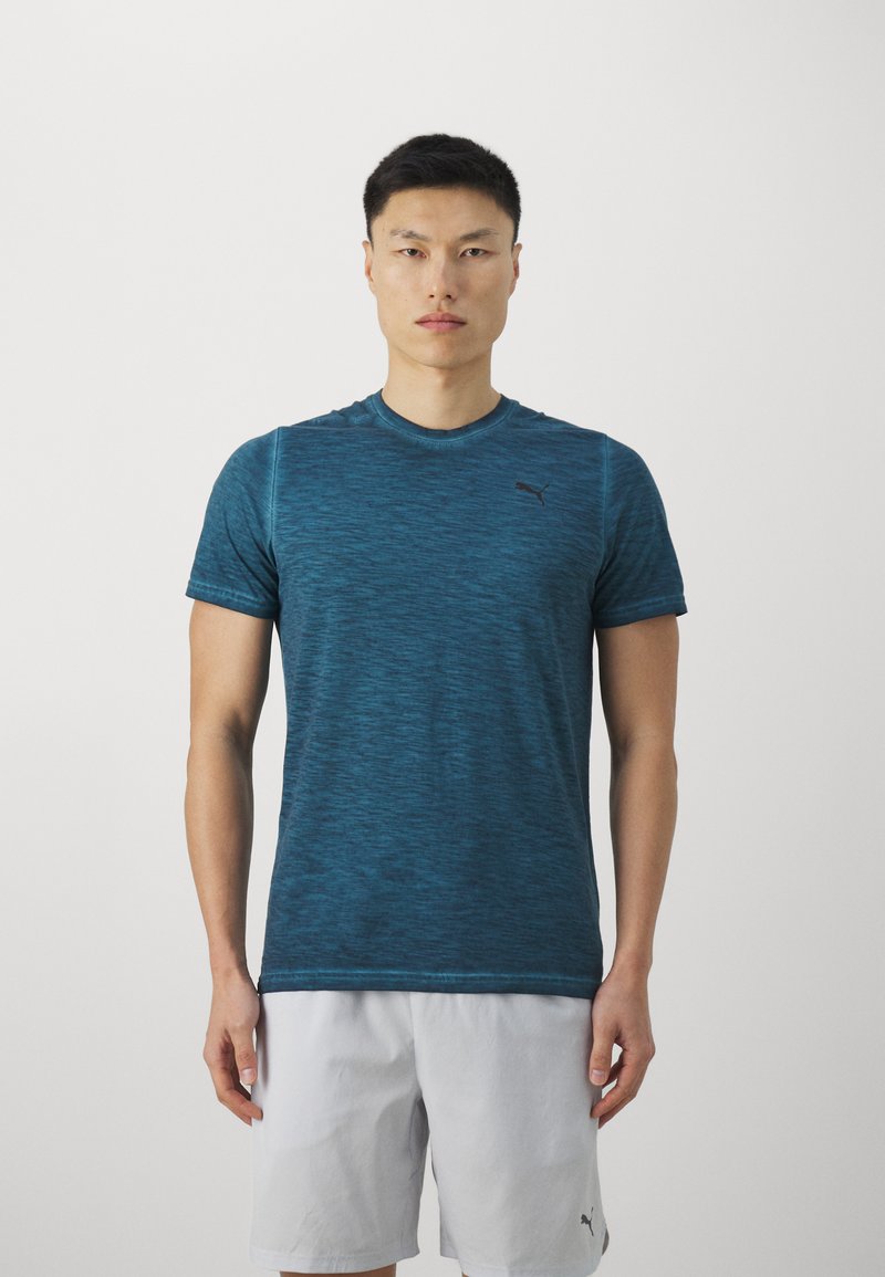 Puma STUDIO FOUNDATION WASH TEE - Sports T-shirt - ocean tropic/dark ...