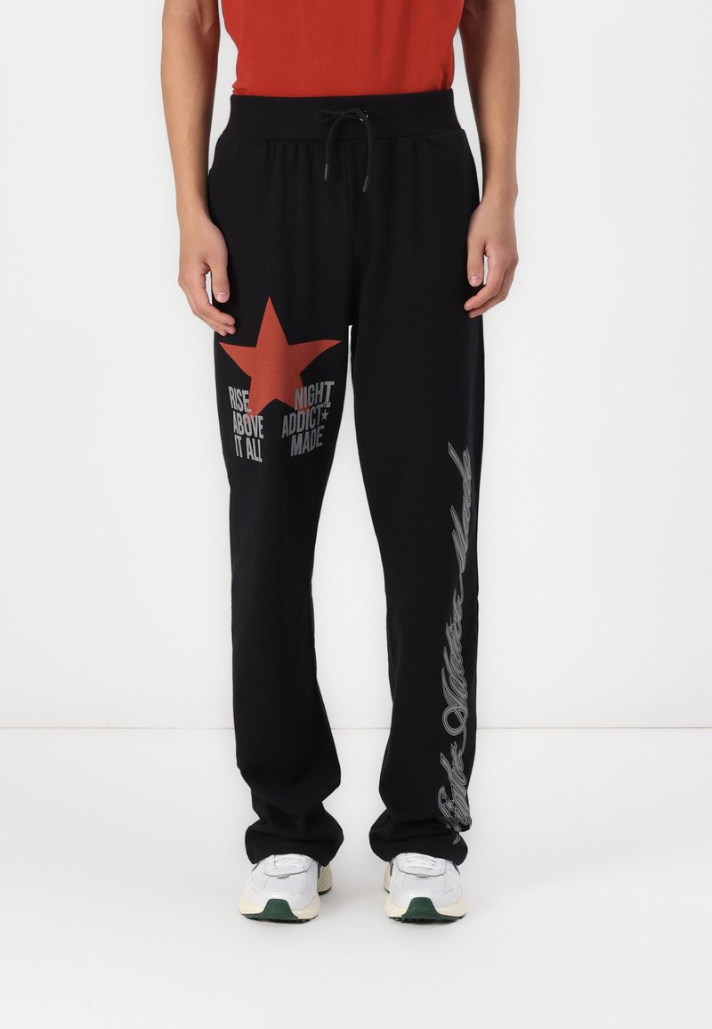 Night Addict Tracksuit bottoms - black - Zalando.ie