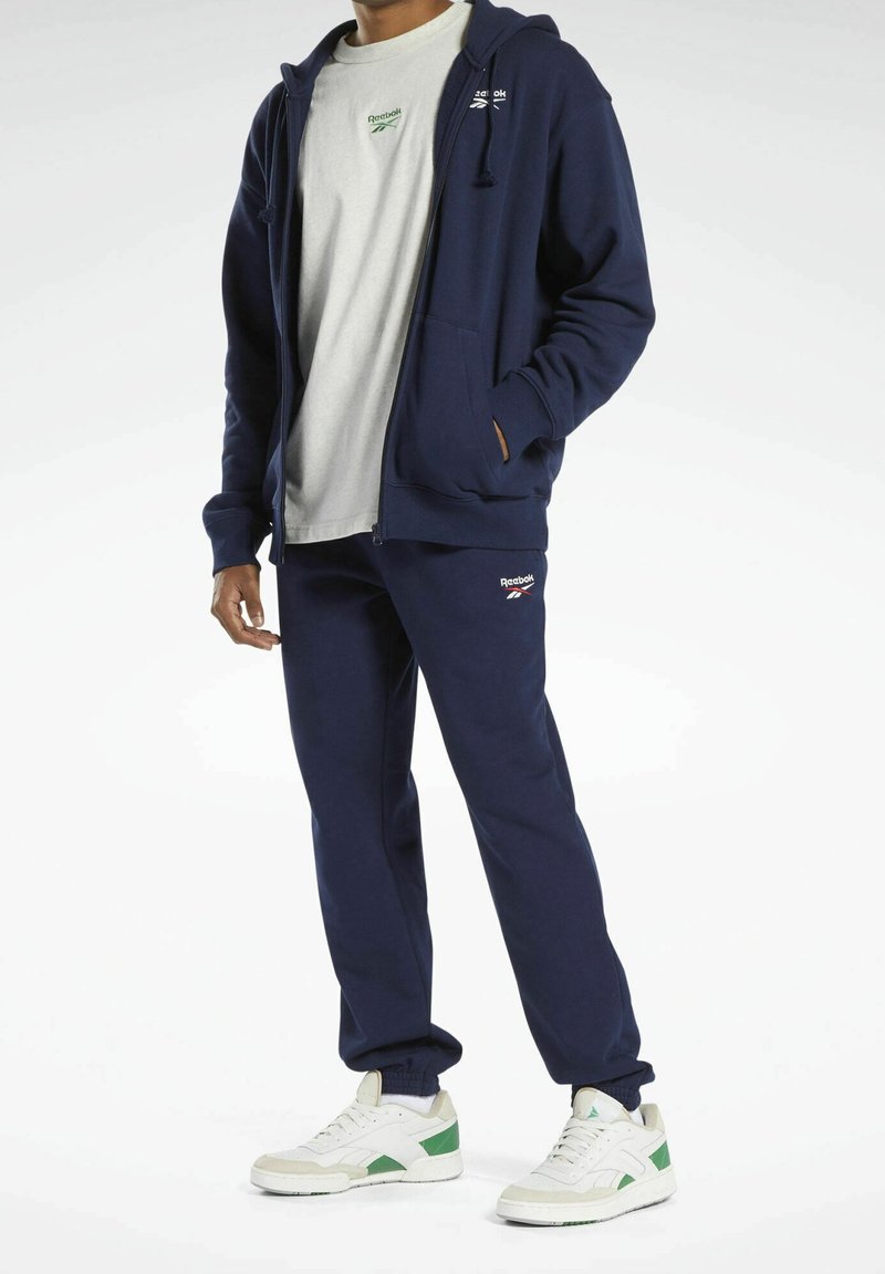 Reebok Classic SMALL VECTOR - Tracksuit bottoms - vector navy/dark blue ...