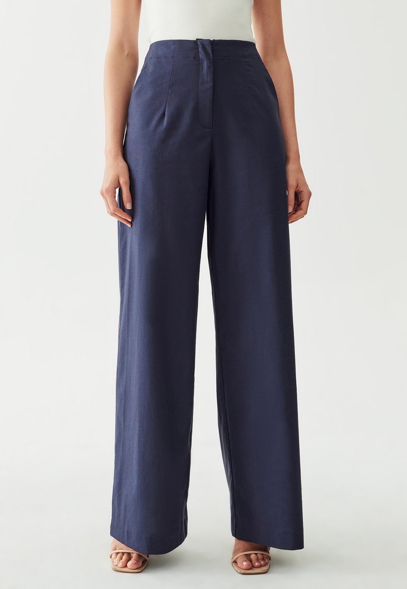 TUSSAH Kalhoty - navy blue/modrá - Zalando.cz