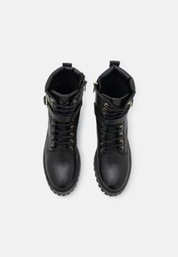 Tommy Hilfiger BUCKLE LACE UP BOOT - Schnürstiefelette - black/schwarz - Zalando.de
