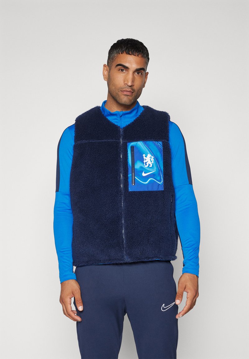 Nike Performance CHELSEA NIKE CLUB+ WINTER VEST REVERSIBLE - Vest - obsidian/white/tumesinine ...