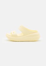 Crocs CRUSH UNISEX - Muiltjes met hak - buttercream/geel - Zalando.nl