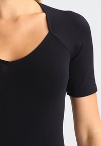 FALKE FALKE SHORT SLEEVE FALKE BODY BLICKDICHT BEIGE - Body - black ...