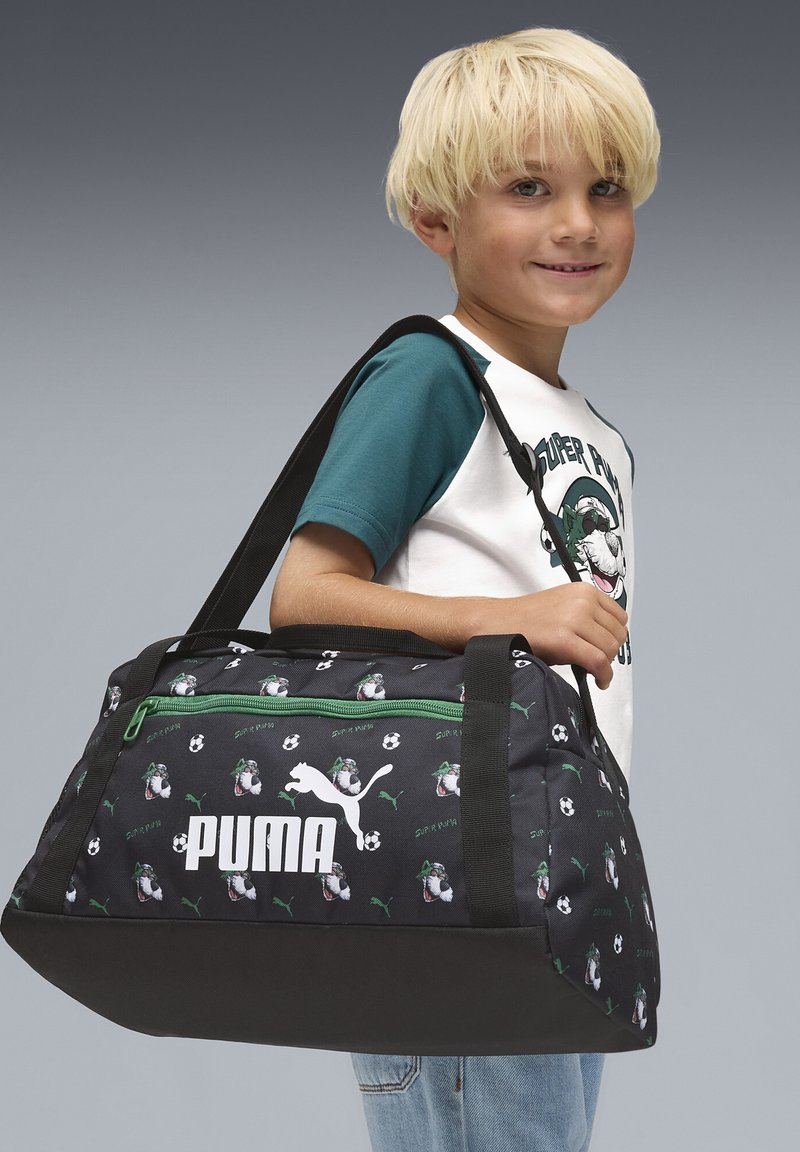 Puma PHASE SUPER EXTRA KLEINE - Sports bag - black super aop/black ...
