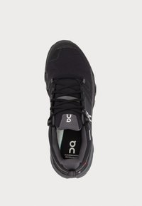 On CLOUDWANDER WATERPROOF - Walking shoes - black eclipse/black - Zalando