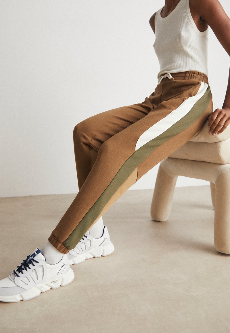 BOSS ALICA - Tracksuit bottoms - rust/copper/brown - Zalando
