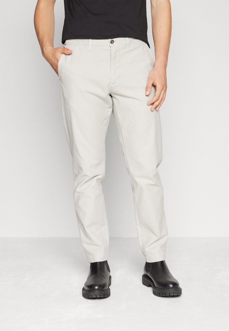 Tommy Hilfiger CHELSEA GABARDINE GMD - Trousers - october grey/grey ...