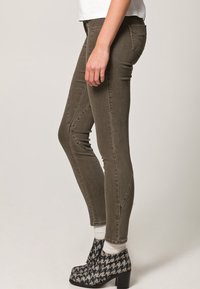 Miss Sixty Slim fit jeans - olive/olijfgroen - (Pre-owned) - Zalando.nl