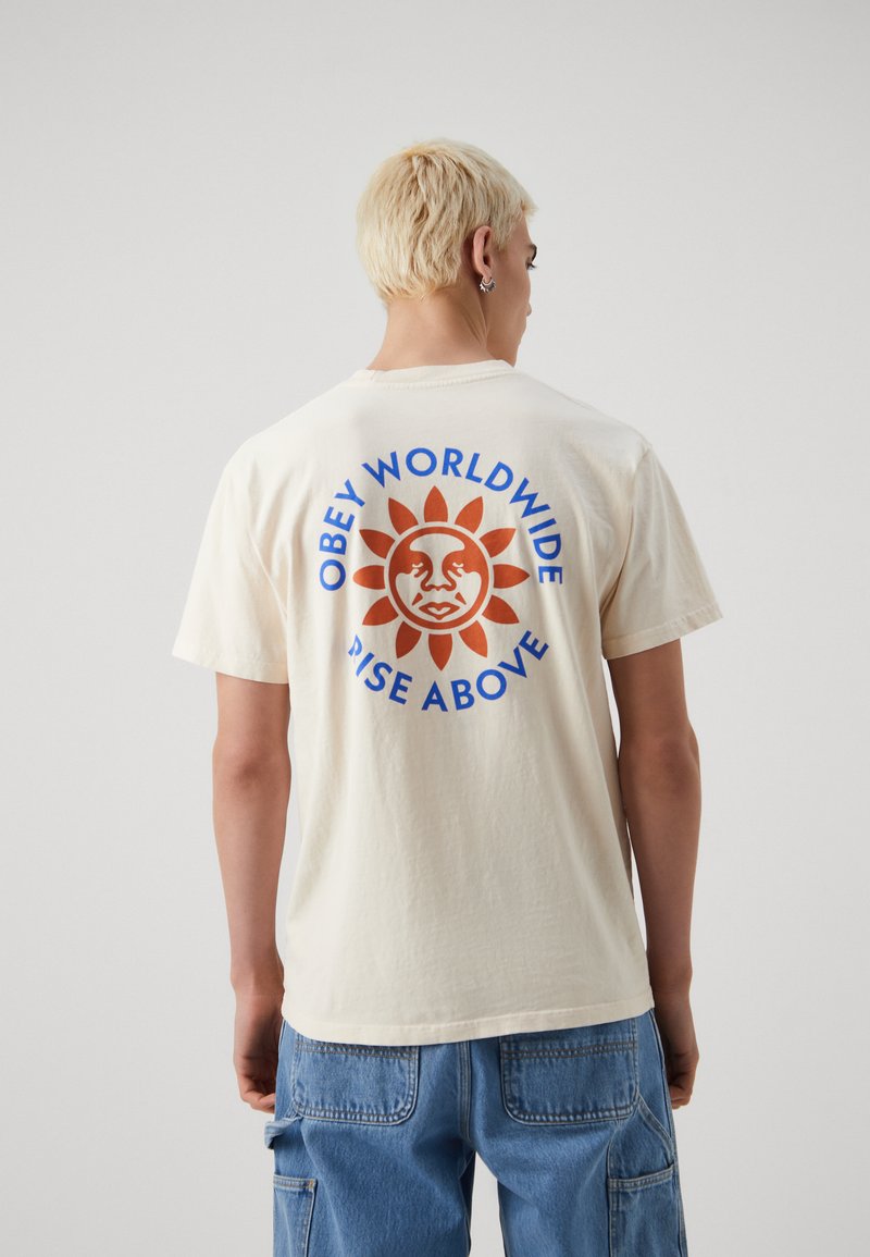 Obey Clothing RISE ABOVE UNISEX - T-Shirt print - sago/offwhite ...