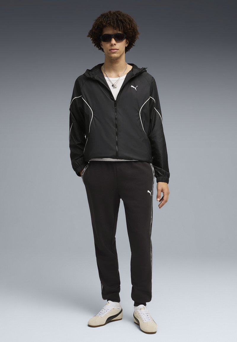 Puma ESSENTIALS TAPE JOGGING - Pantalon de survêtement - black/noir ...