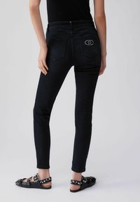LIU JO HIGH-RISE - Jeans Tapered Fit - black/zwart - Zalando.be
