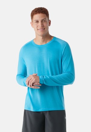 Helly Hansen LIFA MERINO MIDWEIGHT CREW - Longsleeve - blue fog ...