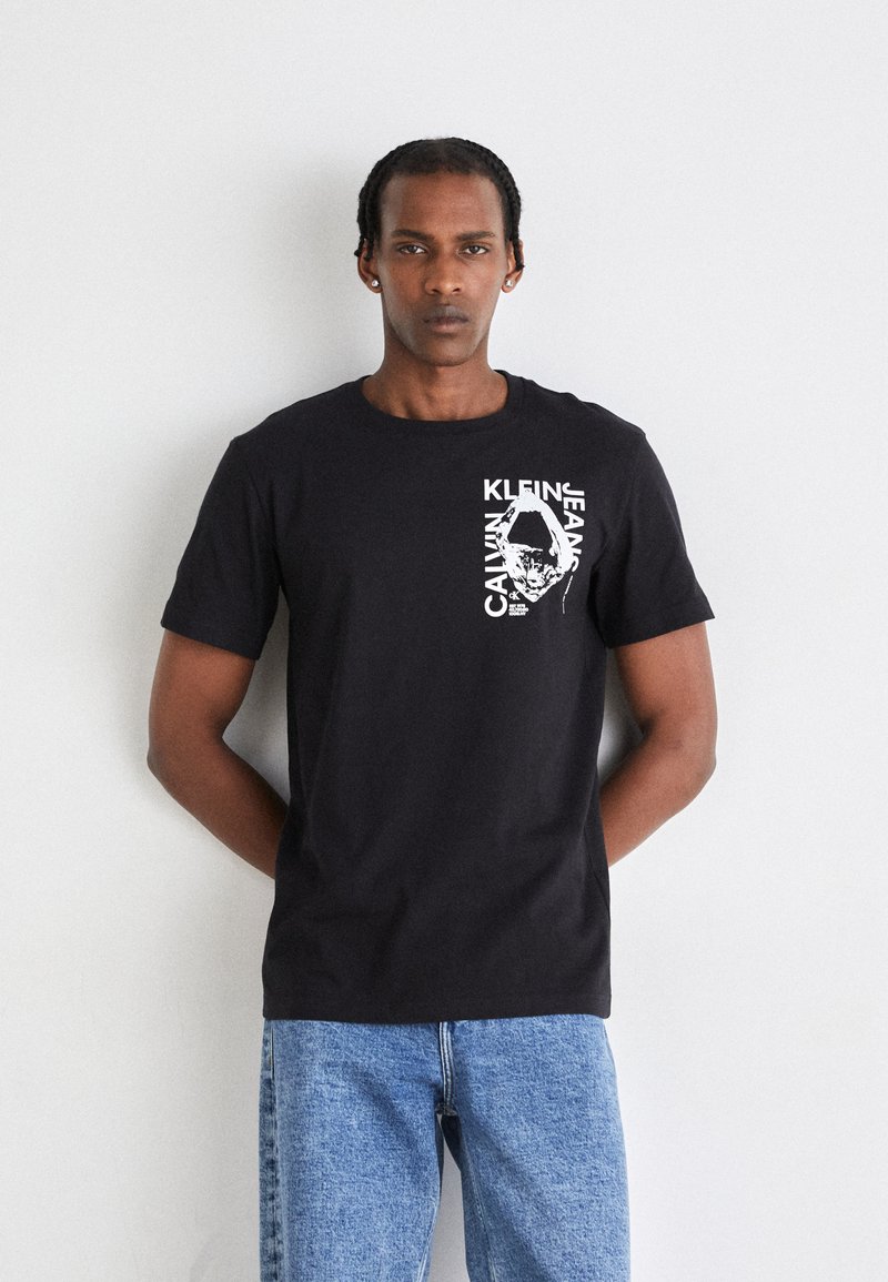 Calvin Klein Jeans MODERN METALS GRAPHIC TEE - Print T-shirt - black ...