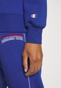 Champion COLOR PUNCH HOODED - Kapuzenpullover - dark blue/dunkelblau ...