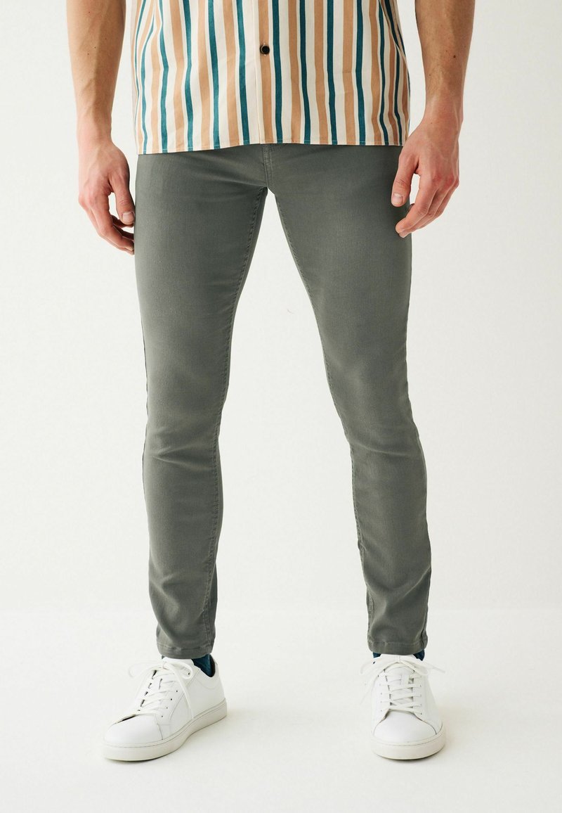 Next MOTION FLEX STRETCH - Vaqueros slim fit - green/verde - Zalando.es