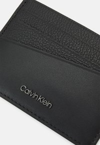 Calvin Klein DIAGONAL CARDHOLDER UNISEX - Portafoglio - black/nero ...