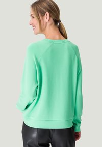 zero MIT GLITZERSTEINCHEN - Sweatshirt - patch greengreen/grün - Zalando.de