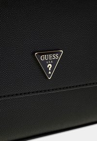 Guess ISOBEL - Sac à main - schwarz/noir - ZALANDO