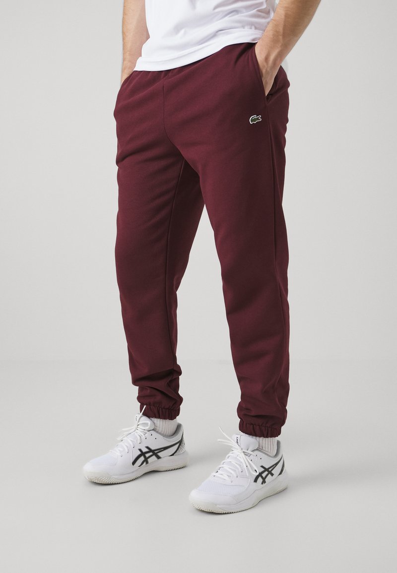 Lacoste Sport Tracksuit bottoms - expresso/bordeaux - Zalando.ie