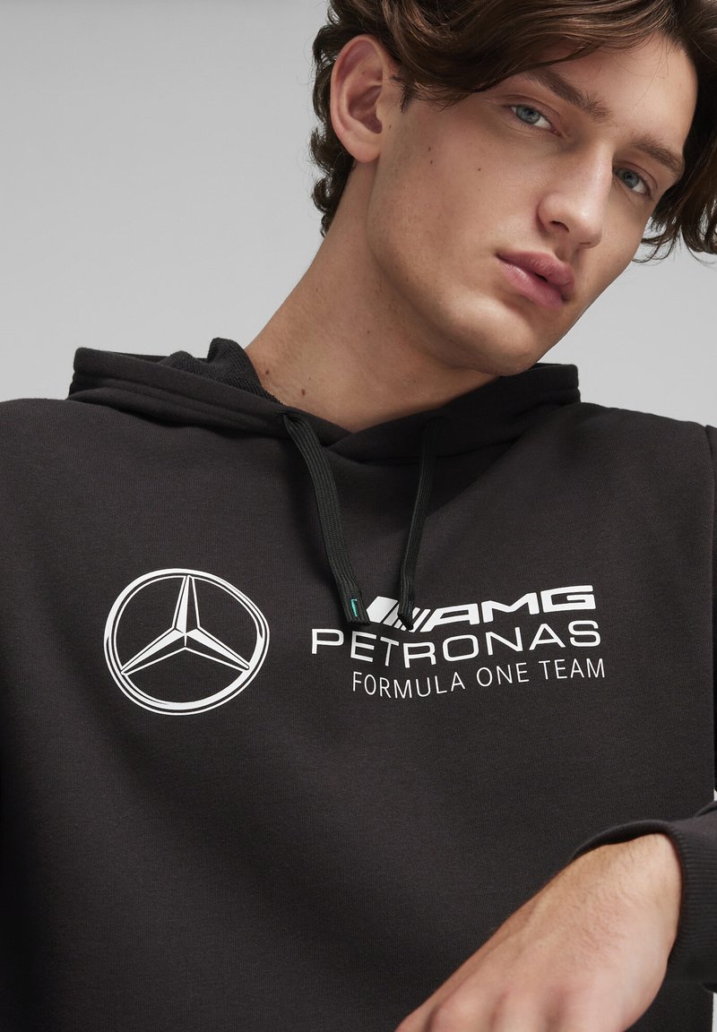 Puma MERCEDES-AMG PETRONAS MOTORSPORT ESS - Jersey con capucha - black ...