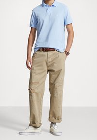 Polo Ralph Lauren Piké - light blue/ljusblå - (Pre-owned) - Zalando.se