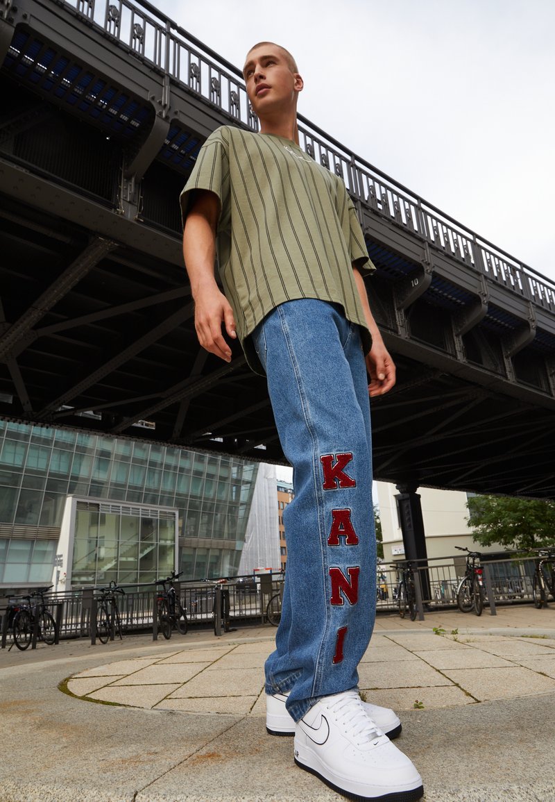 Karl Kani PATCHED BAGGY FIVE POCKET - Relaxed fit jeans - vintage ...