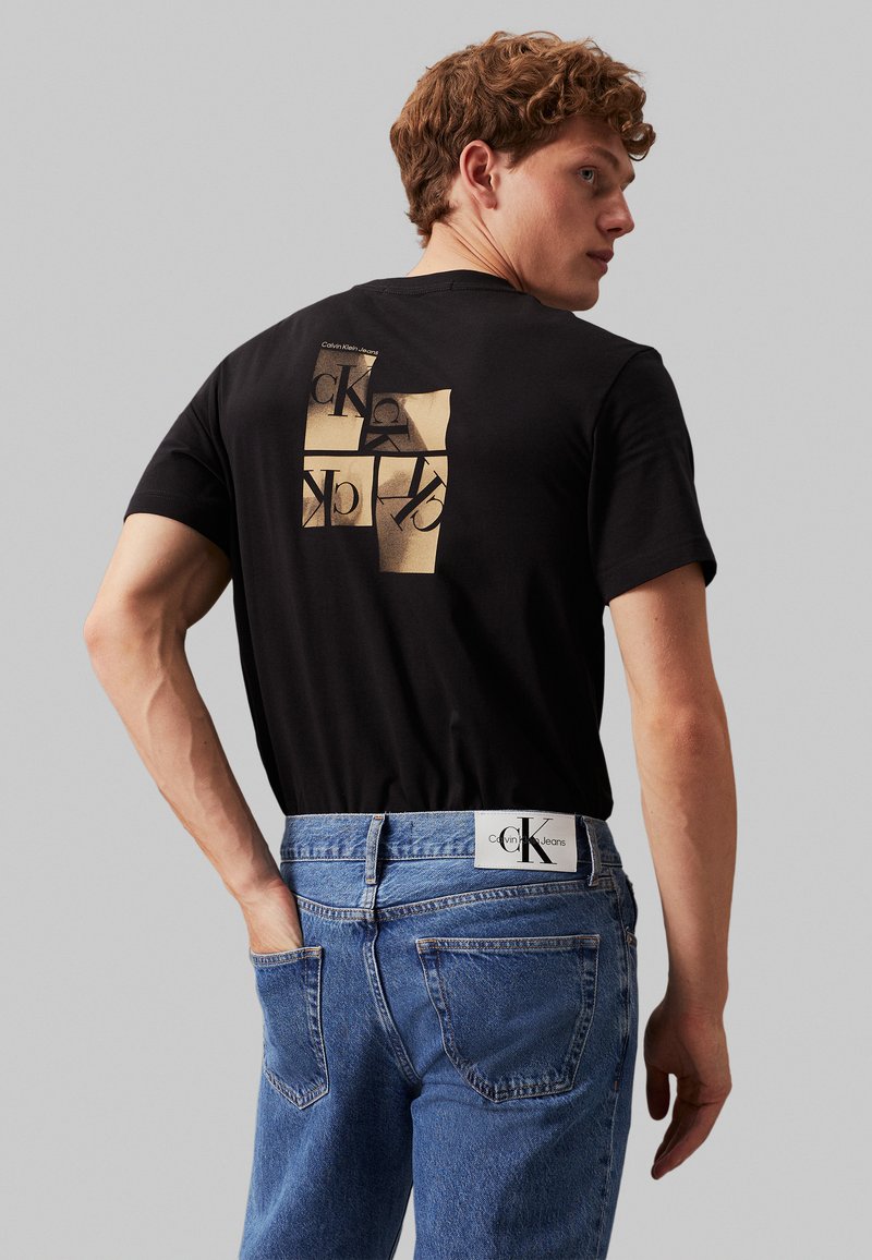 Calvin Klein Jeans MULTIBOX TEE - Print T-shirt - black - Zalando.co.uk