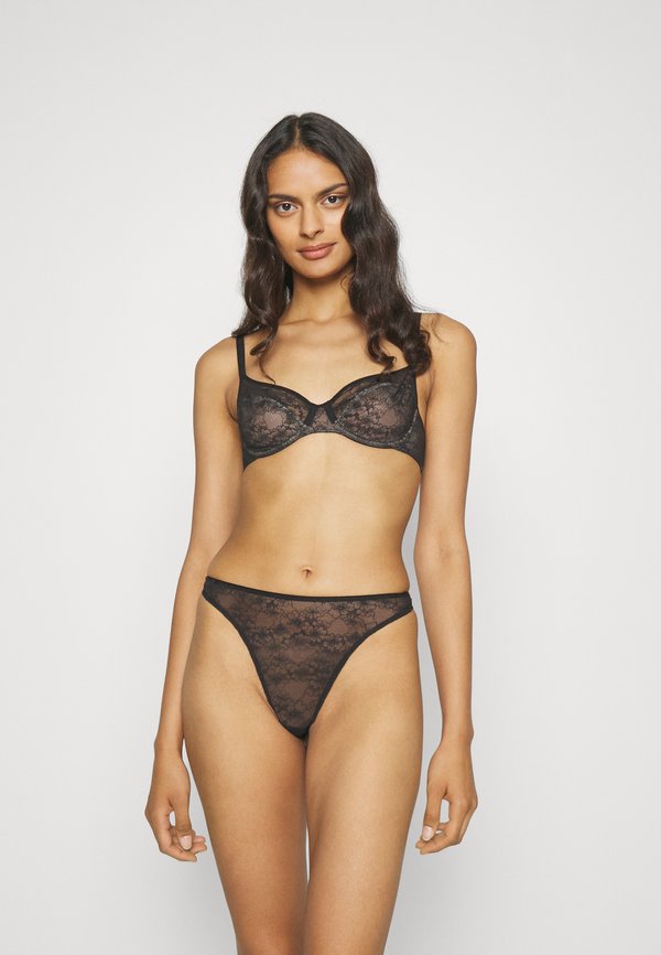 Triumph BRIGHT SPOTLIGHT HIGHLEG - String - black/zwart - Zalando.nl