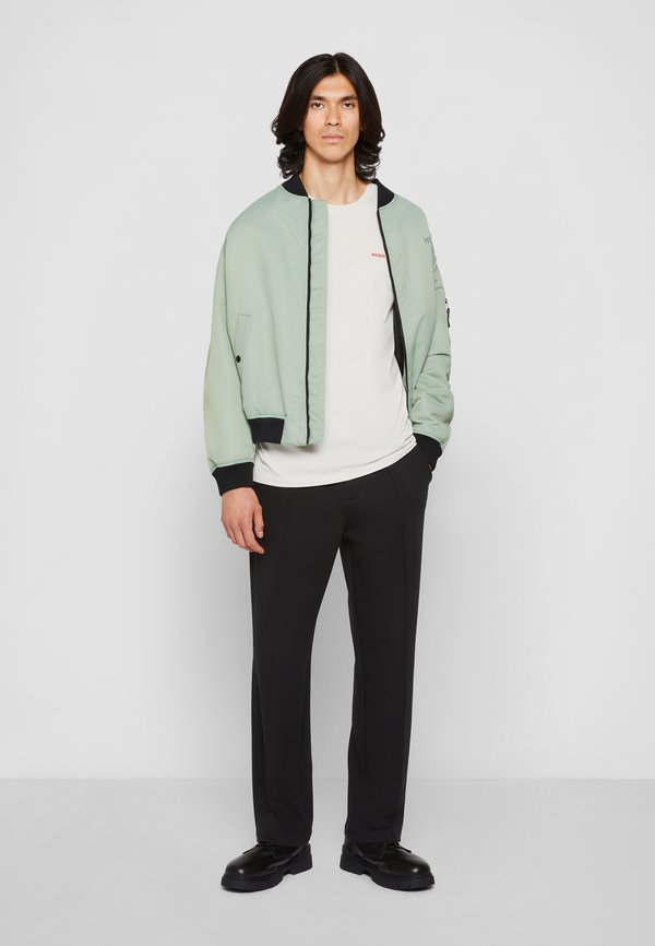 Weekday KEN TRACKPANTS UNISEX - Pantalon classique - black/noir ...