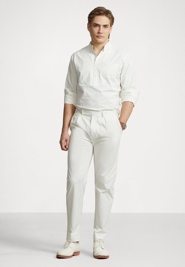 Polo Ralph Lauren BEDFORD FLAT PANT - Pantalones chinos - khaki tan/beige - Zalando.es