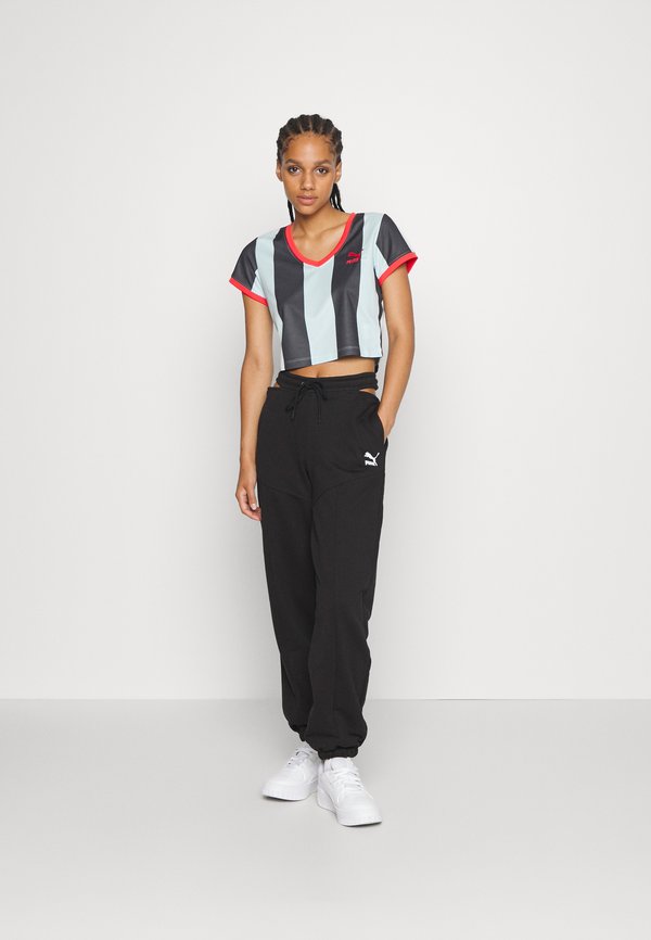 Puma MODEST ACTIVEWEAR WIDE LEG PANT - Jogginghose - black/schwarz ...