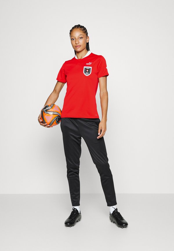 Puma MODEST ACTIVEWEAR WIDE LEG PANT - Spodnie treningowe - black ...