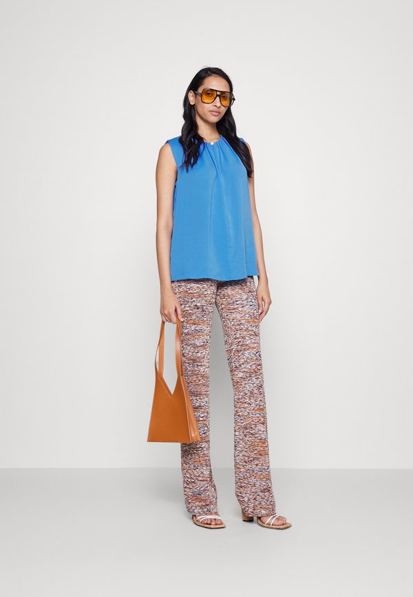 Materiel PYTHON PANTS - Pantalones - yellow/amarillo - Zalando.es