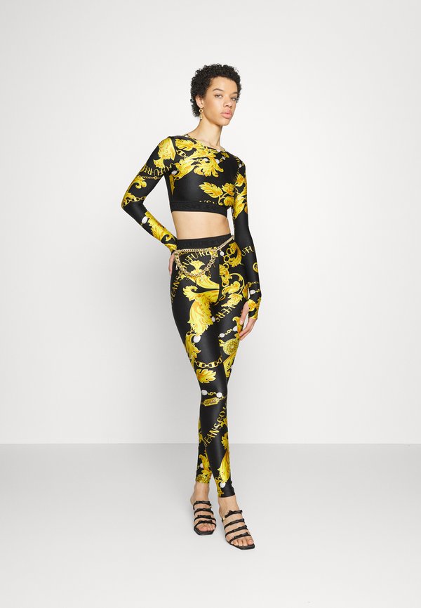 Versace Jeans Couture CHAIN - Leggings - Hosen - black/gold/schwarz ...