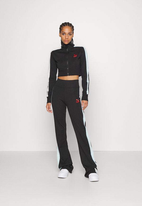 Puma MODEST ACTIVEWEAR WIDE LEG PANT - Spodnie treningowe - black ...