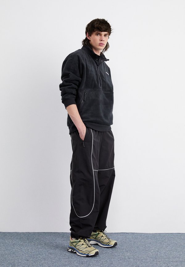 Puma GARAGE PANTS - Tracksuit bottoms - black - Zalando.co.uk
