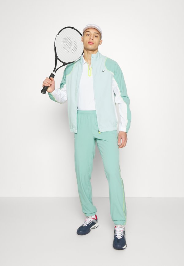 Lacoste Sport TENNIS TOUR - Poloskjorter - white/pastille mint lima ...