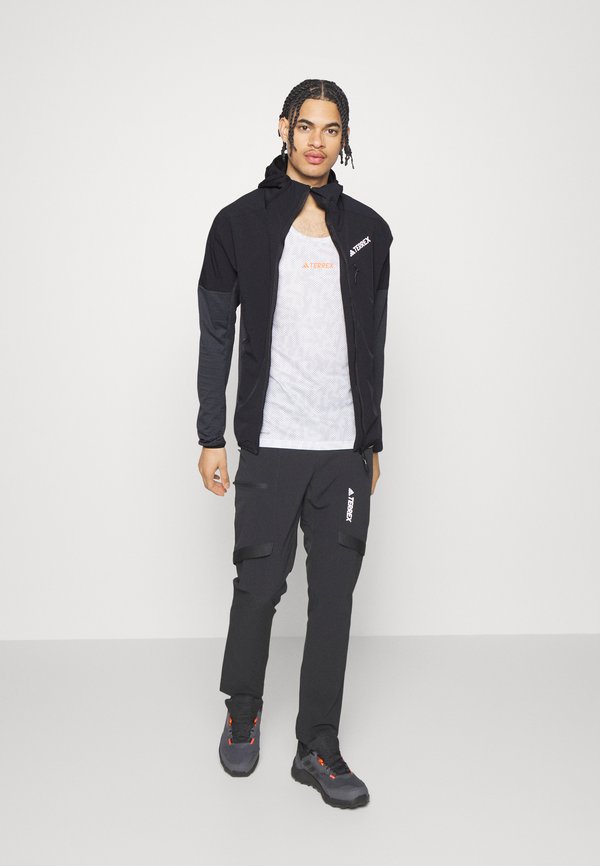 Under Armour RUN EVERYWHERE SINGLET - Top - black/beta/reflective ...