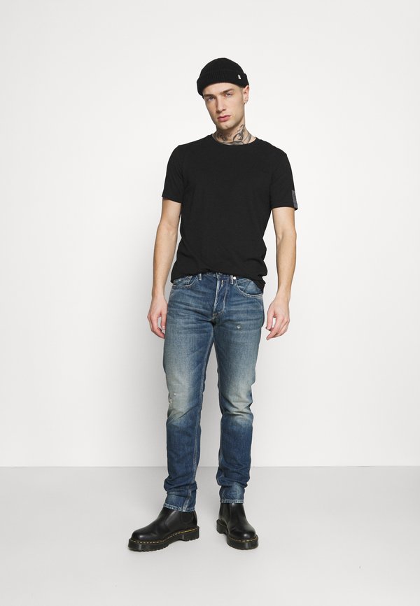 Replay ANBASS HYPERFLEX REUSED X LITE - Jeans Tapered Fit - dark blue ...