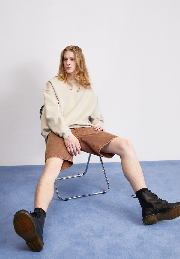 Carhartt WIP BRANDON - Denim shorts - blue stone washed/stone blue ...