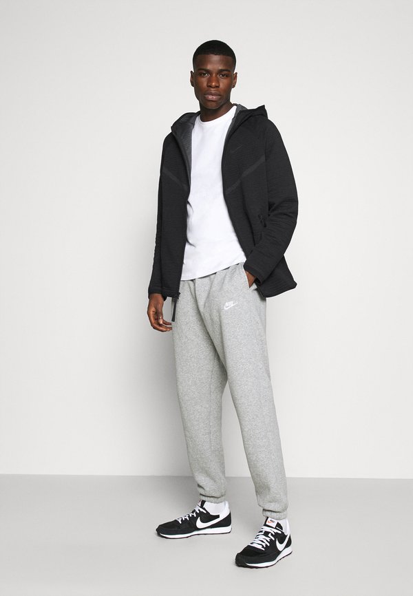 Nike Sportswear CLUB PANT - Tracksuit bottoms - dark grey heather ...