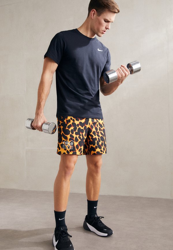 Nike Performance DRY TEE CREW SOLID - Tekninen t-paita - black/white ...